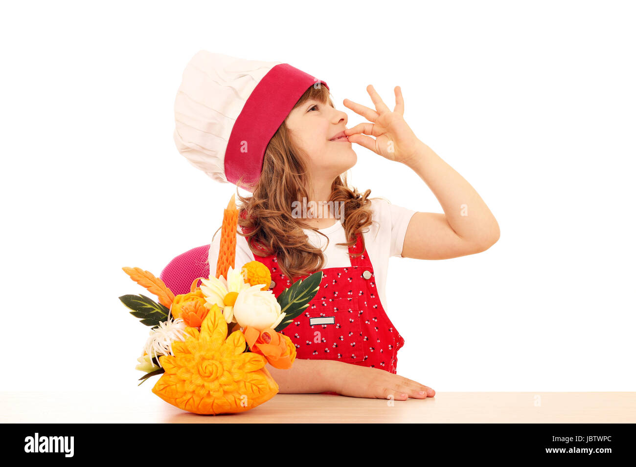 little girl cook with decorated salad and ok hand sign Stock Photo - Alamy