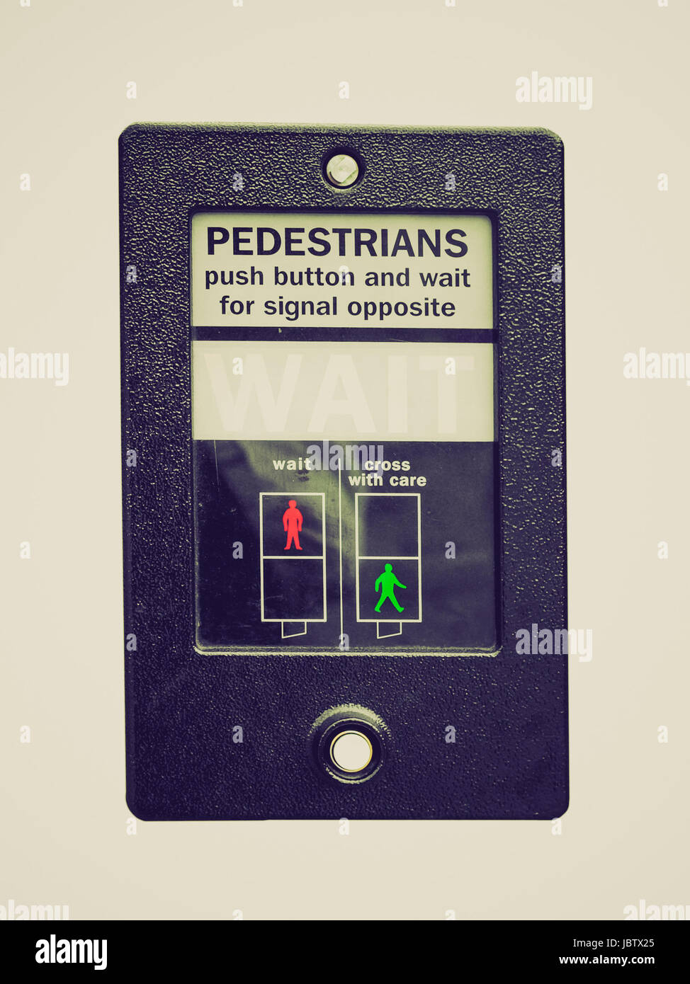Vintage retro looking Wait sign at a traffic light for pedestrian ...