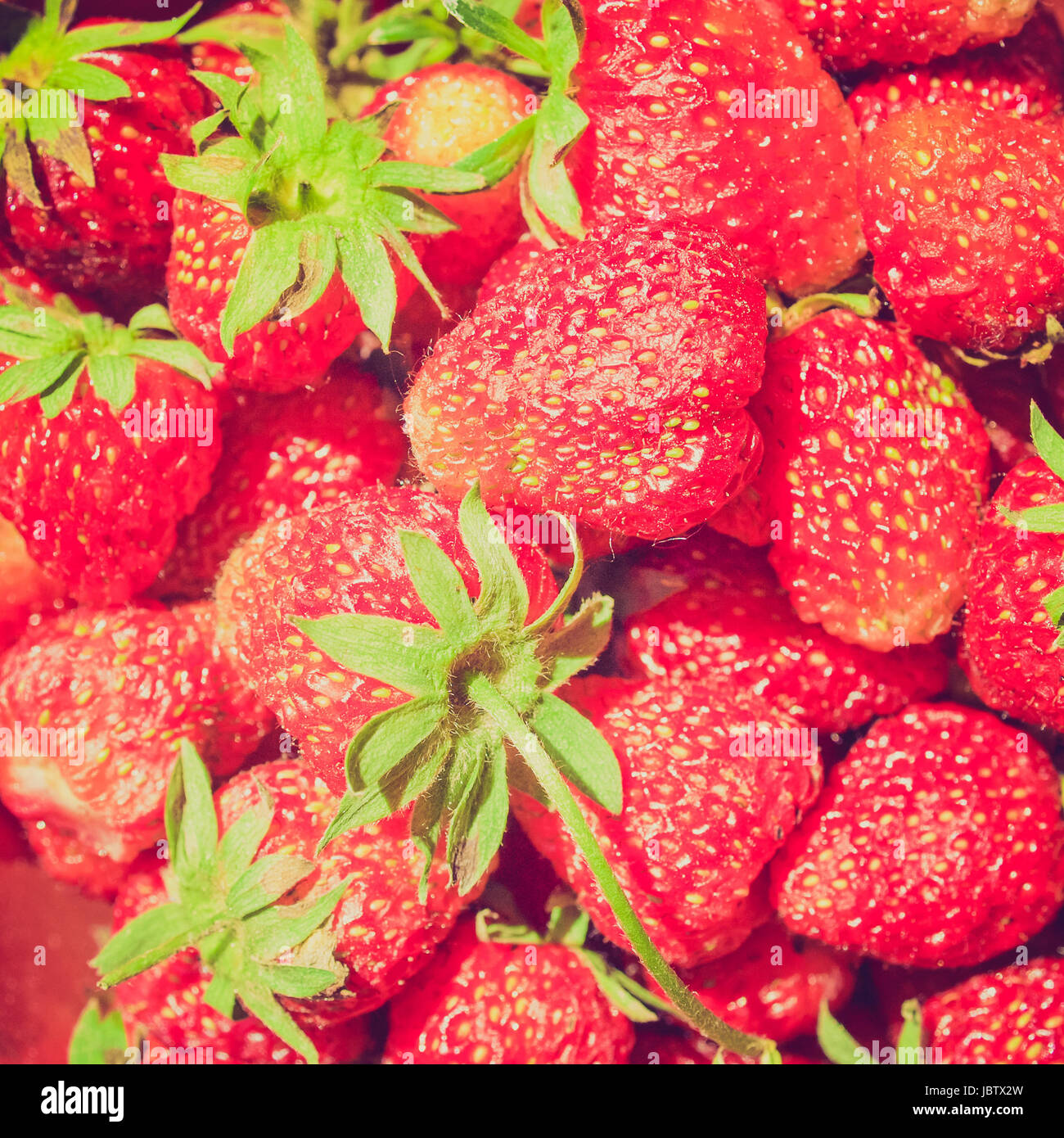 Vintage retro looking Strawberry fruit useful as a food background ...