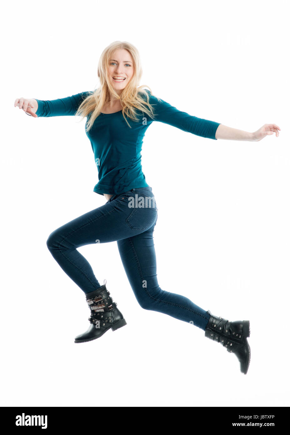 blond girl full of energy Stock Photo - Alamy