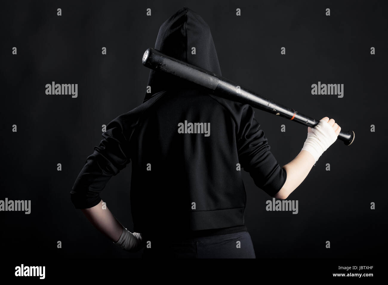 Girl baseball bat back hi-res stock photography and images - Alamy