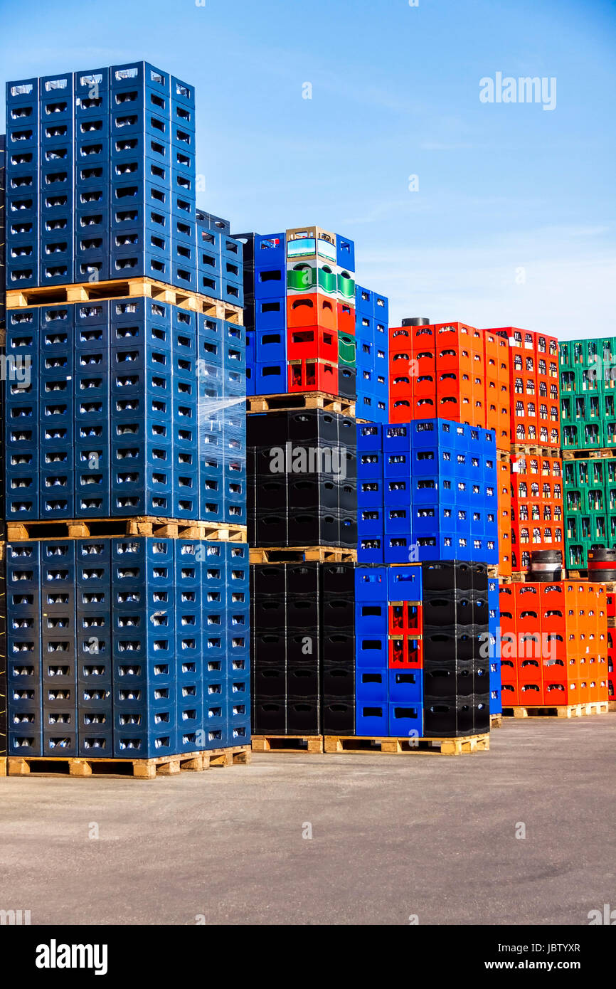Several stacks of colorful beverage bottle crates outdoors Stock Photo ...