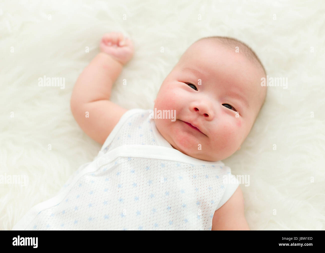 New born baby smile Stock Photo - Alamy