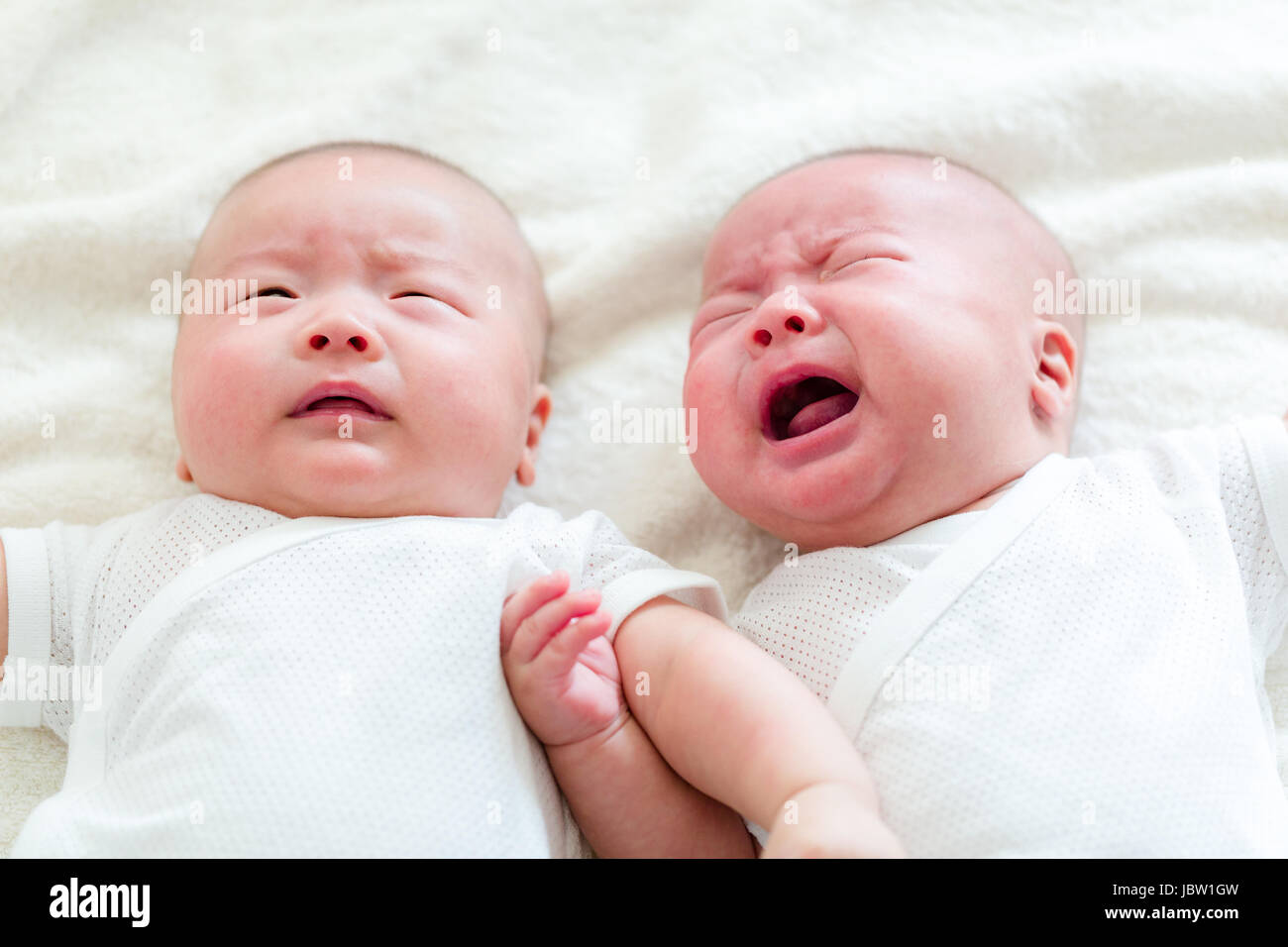 Fraternal twins girl hi-res stock photography and images - Alamy