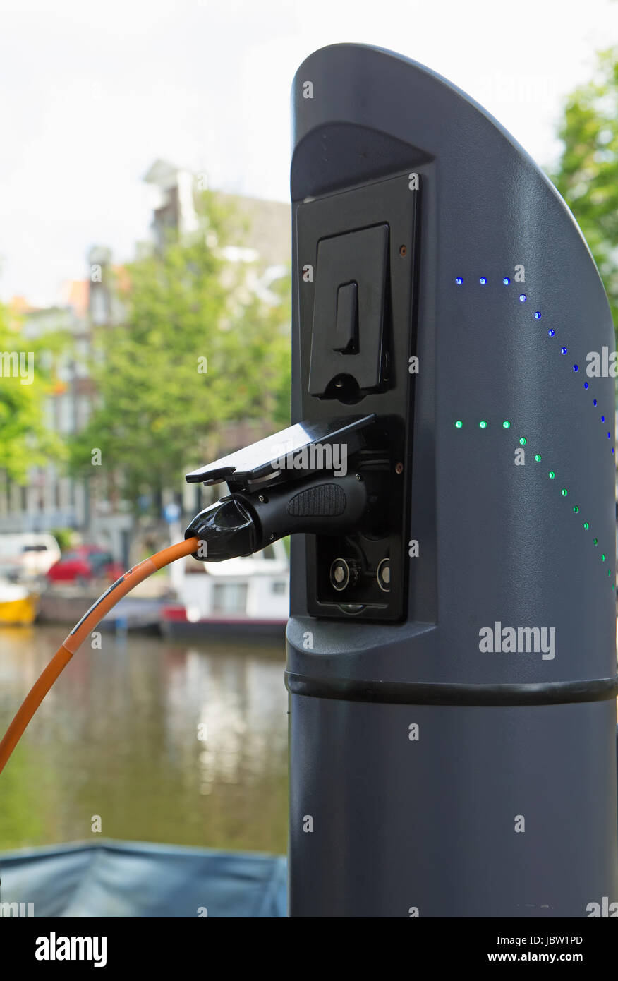 Detailed view of the electric car charger with connected cable Stock ...