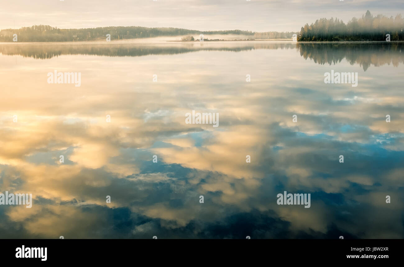 Scenic landscape with lake and beautiful sunrise at morning Stock Photo ...