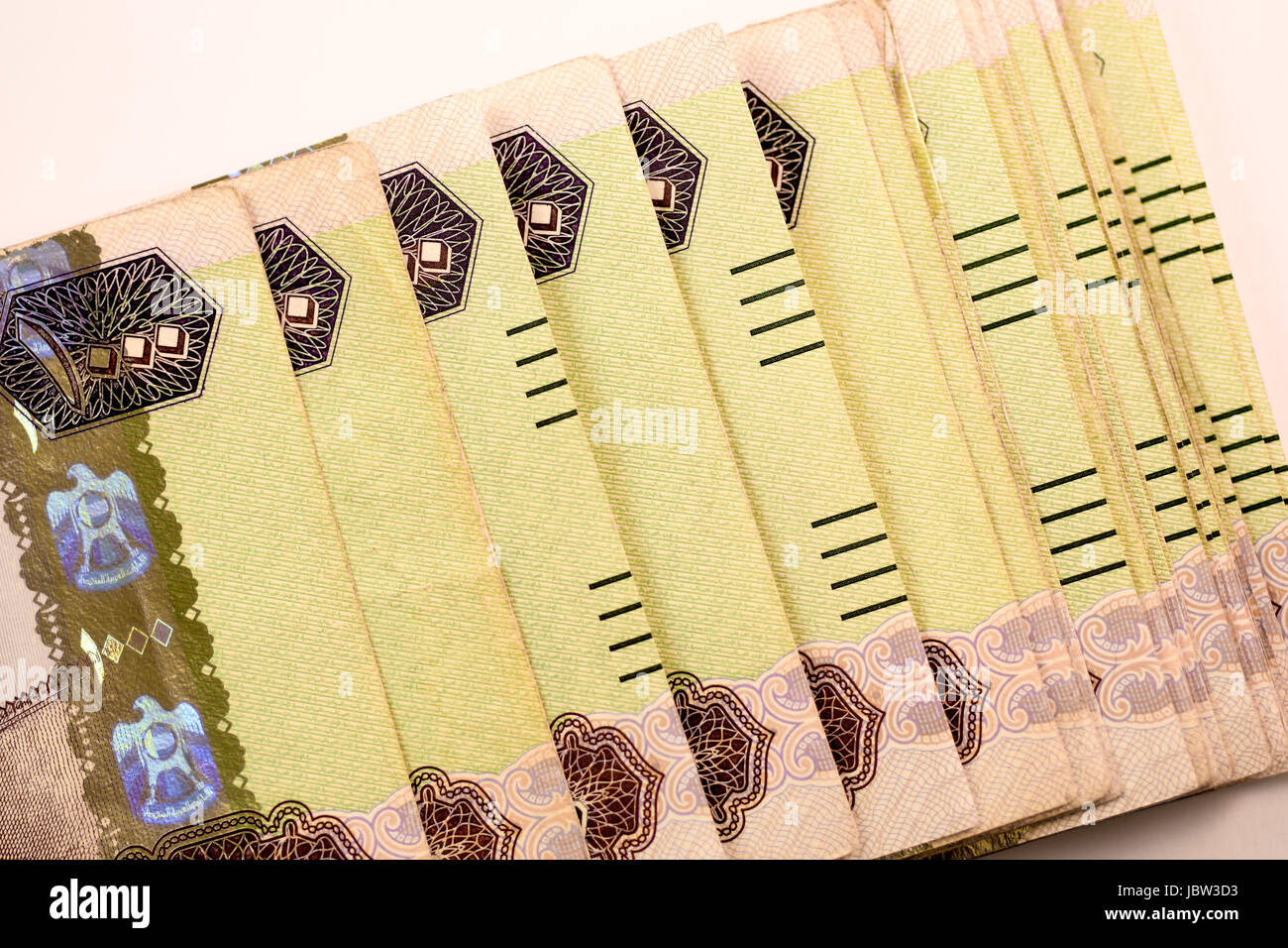 Close up Dirhams currency note and coins, AED, United Arab Emirates ...