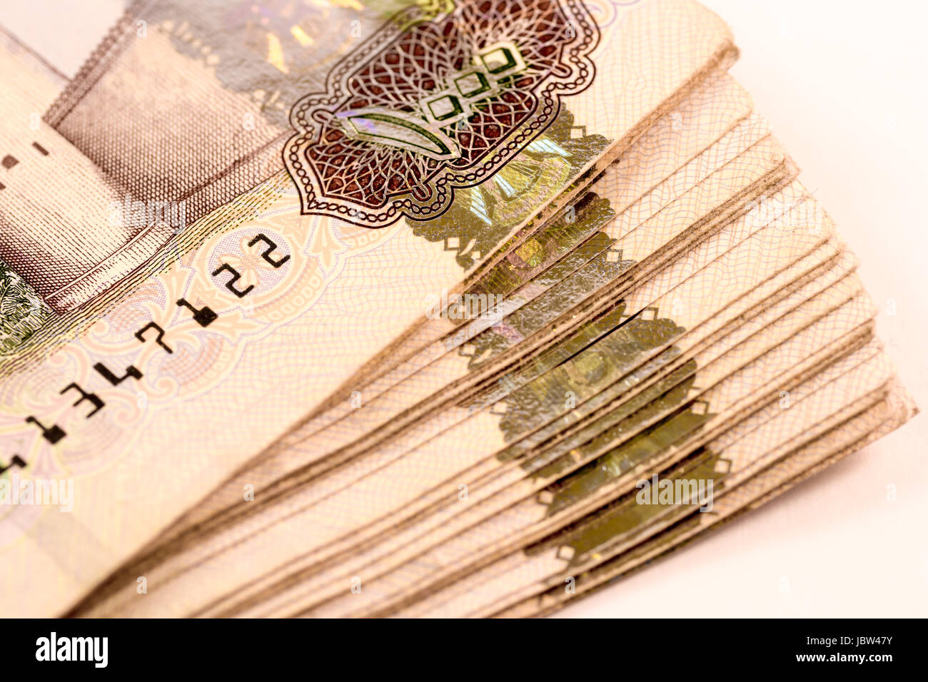 Close up Dirhams currency note and coins, AED, United Arab Emirates ...