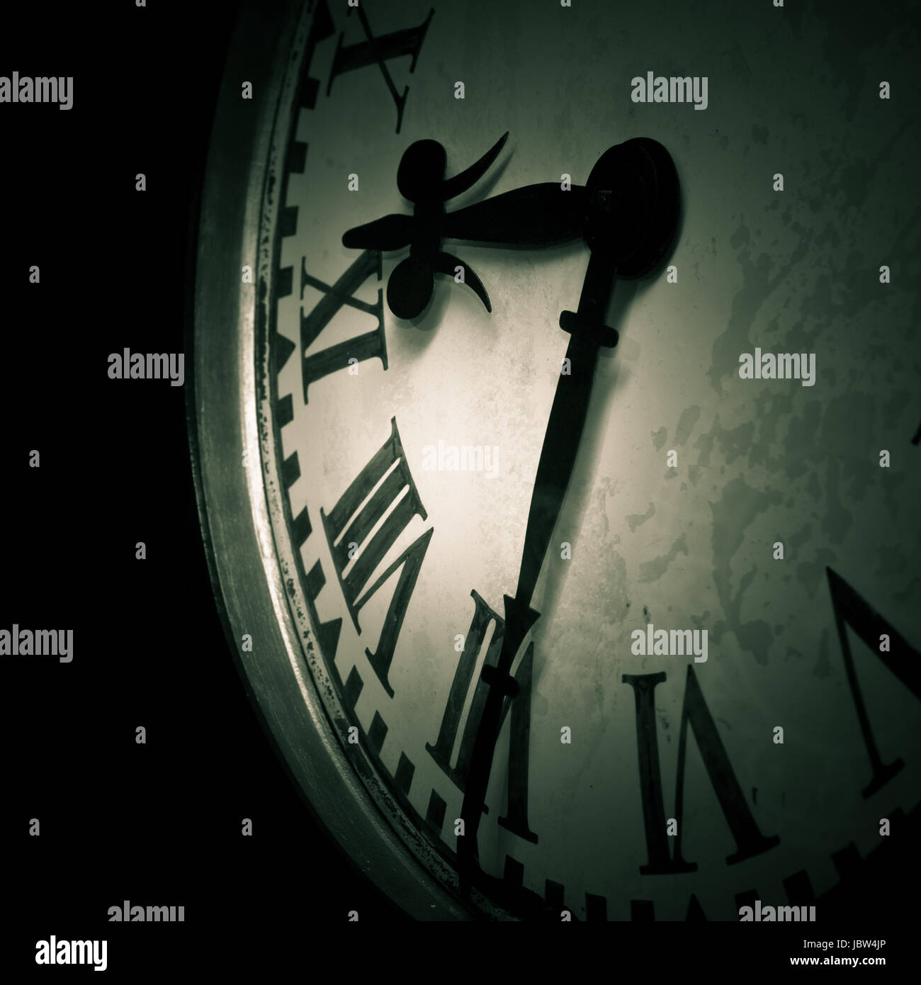 Abstract dark clock detail background Stock Photo - Alamy