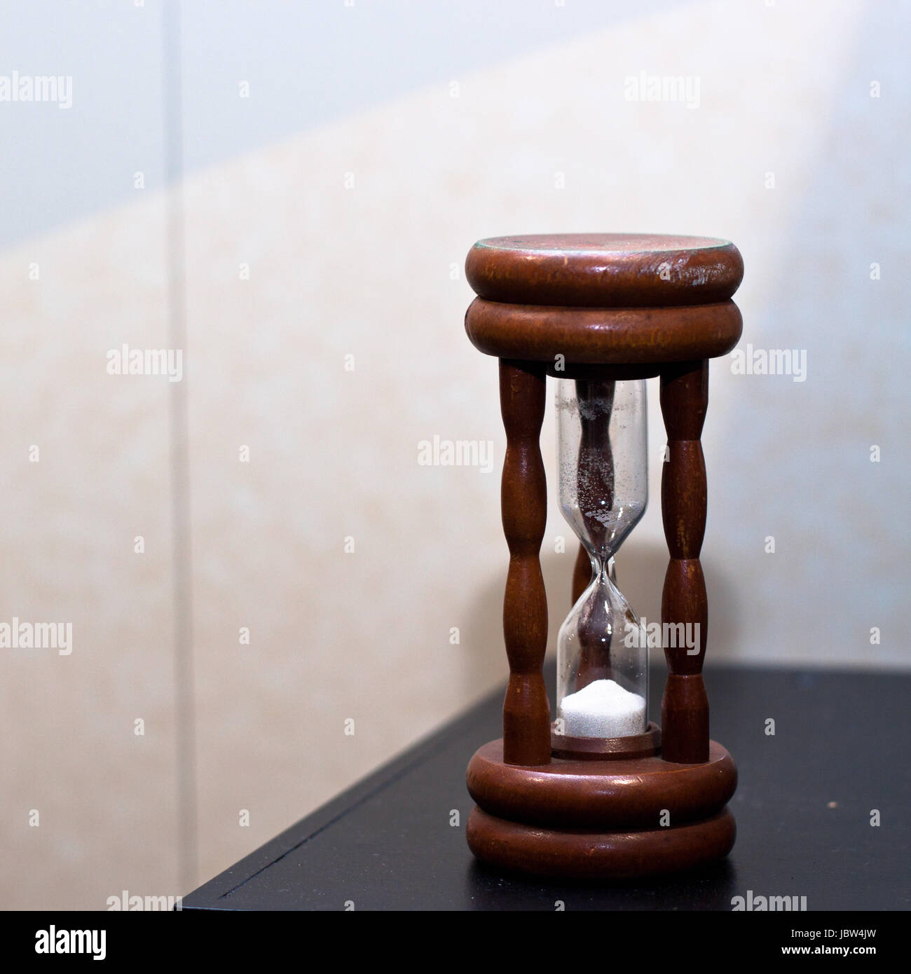 Brown wooden sand clock Stock Photo - Alamy