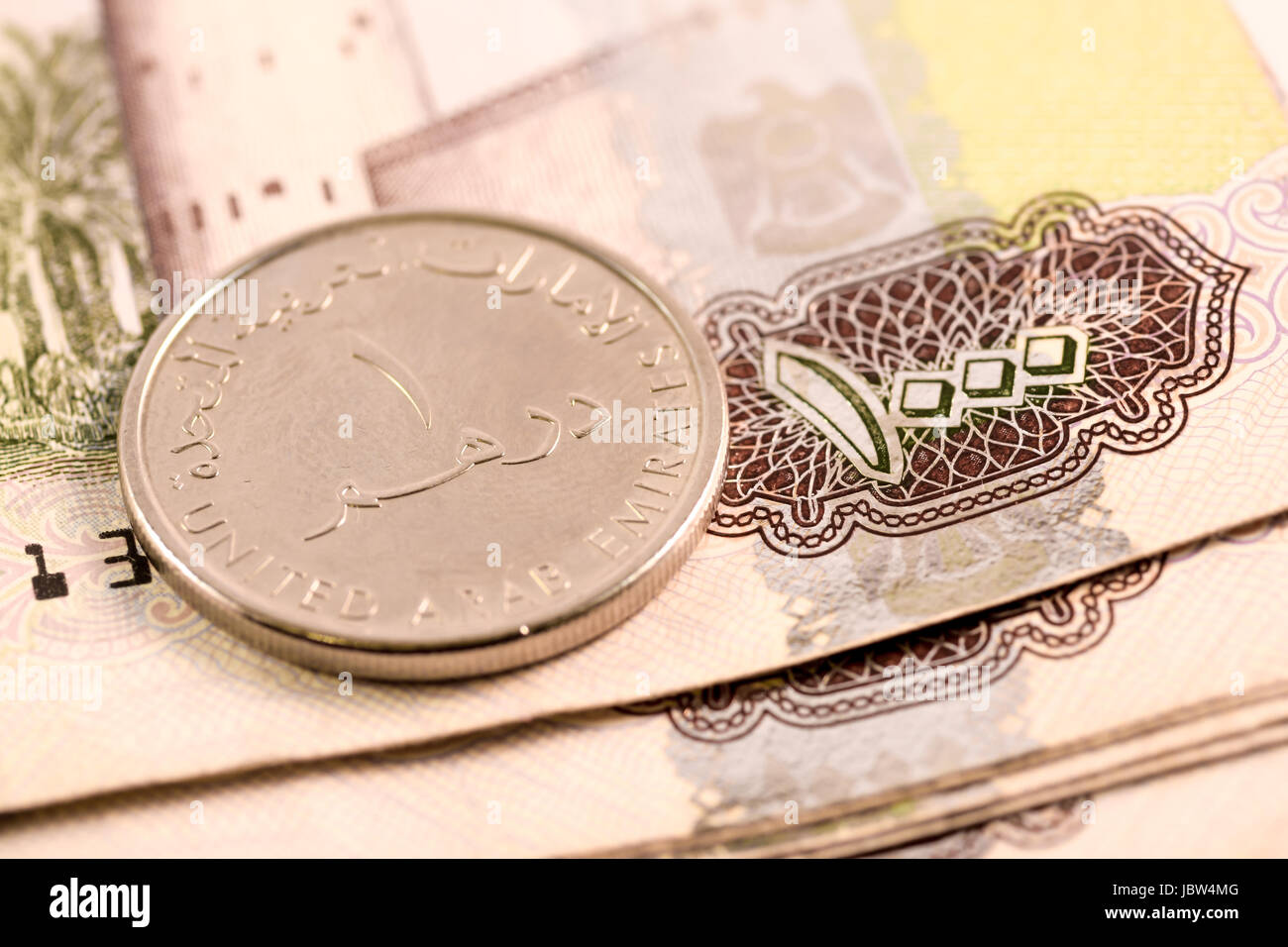 Close up Dirhams currency note and coins, AED, United Arab Emirates ...