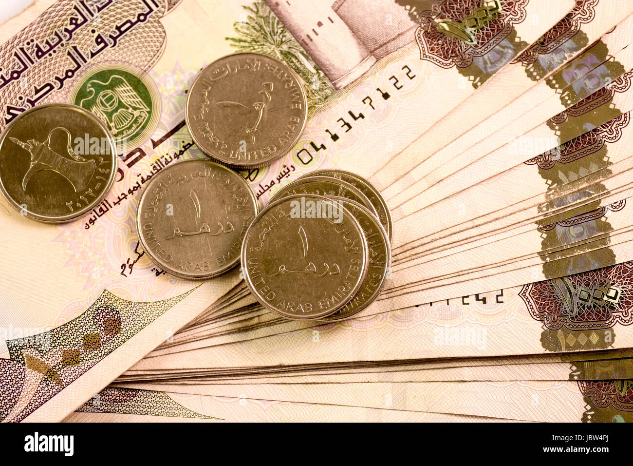 Close up Dirhams currency note and coins, AED, United Arab Emirates ...