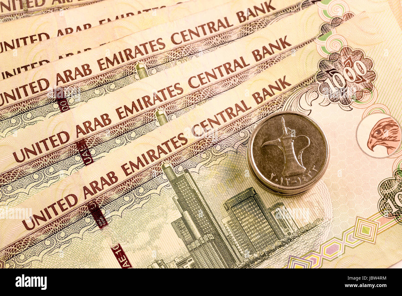 Close up Dirhams currency note and coins, AED, United Arab Emirates ...