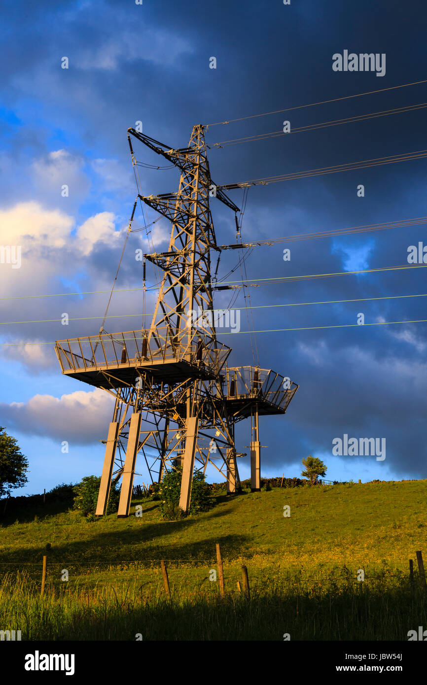 An electricity pylon caught in the evening sun Stock Photo - Alamy