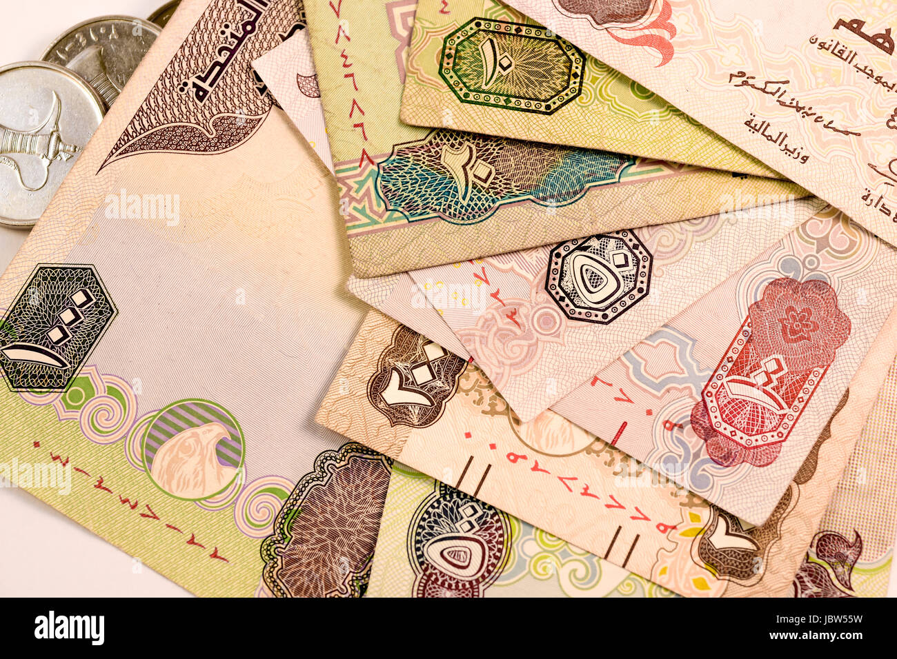 Close up Dirhams currency note and coins, AED, United Arab Emirates ...