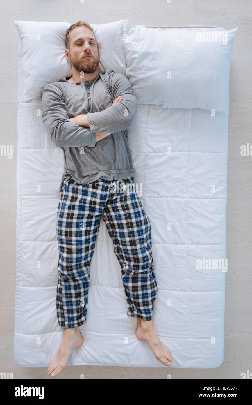 Serious confident man resting at home Stock Photo - Alamy