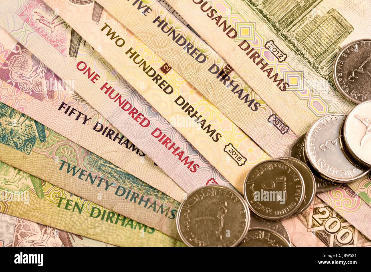 Close up Dirhams currency note and coins, AED, United Arab Emirates ...