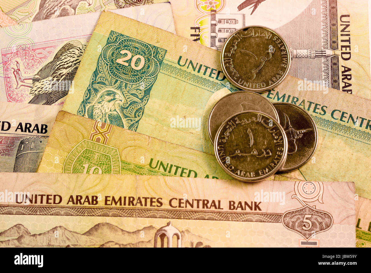 Close up Dirhams currency note and coins, AED, United Arab Emirates ...
