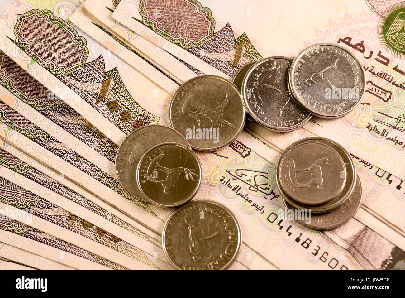 Close up Dirhams currency note and coins, AED, United Arab Emirates ...