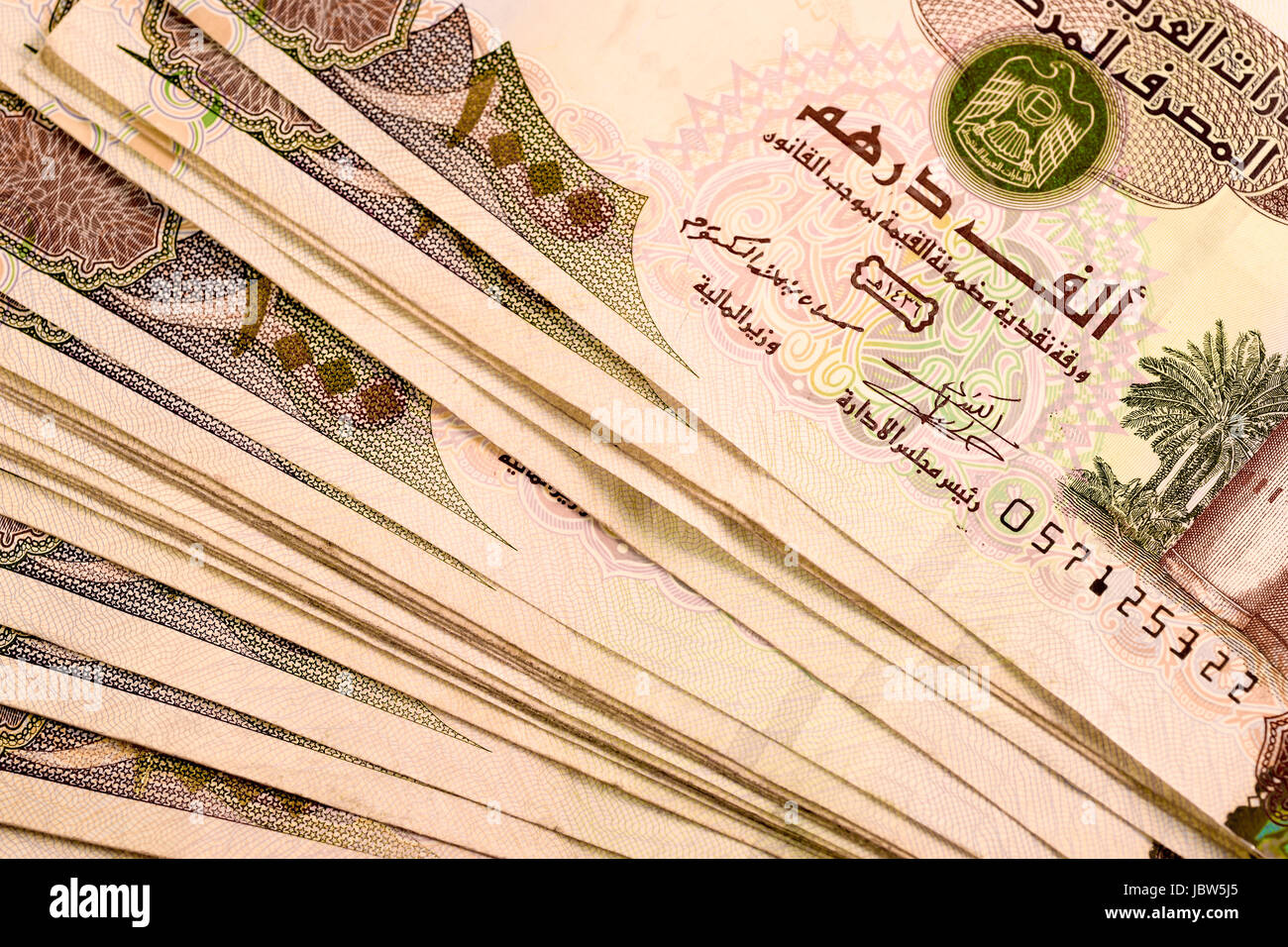 Close up Dirhams currency note and coins, AED, United Arab Emirates ...