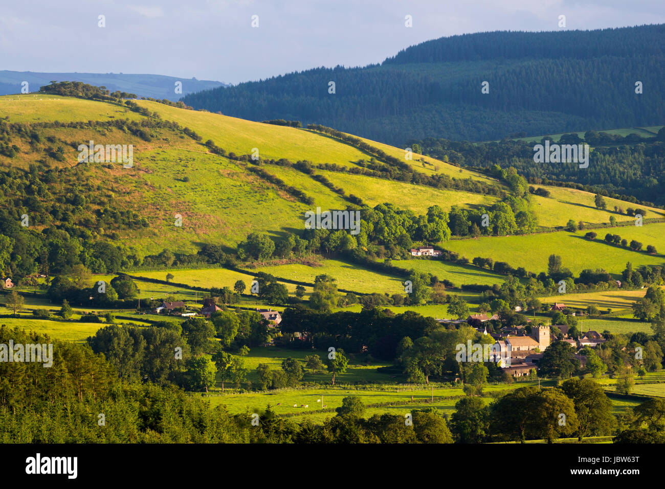The village of Clunbury, overlooked by Clunbury Hill, Shropshire Stock ...