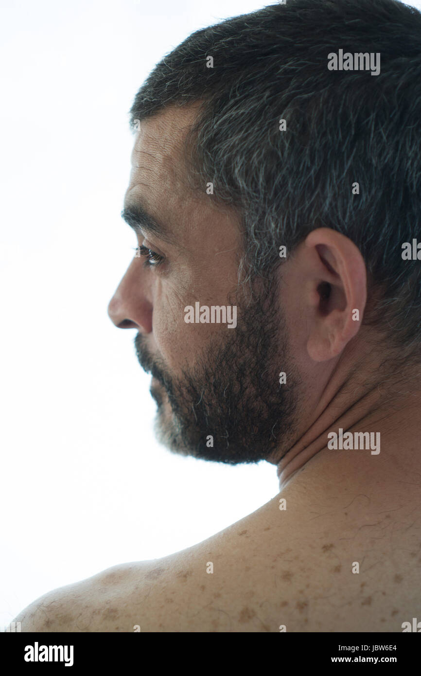 Rear view of a bearded middle eastern man looking away Stock Photo - Alamy