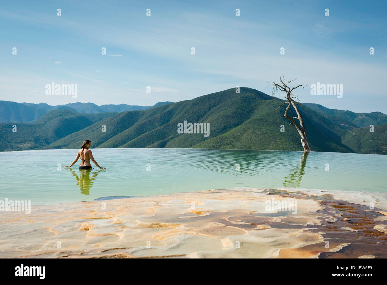 Woman relaxing in thermal spring, Hierve el Agua, Oaxaca, Mexico Stock ...