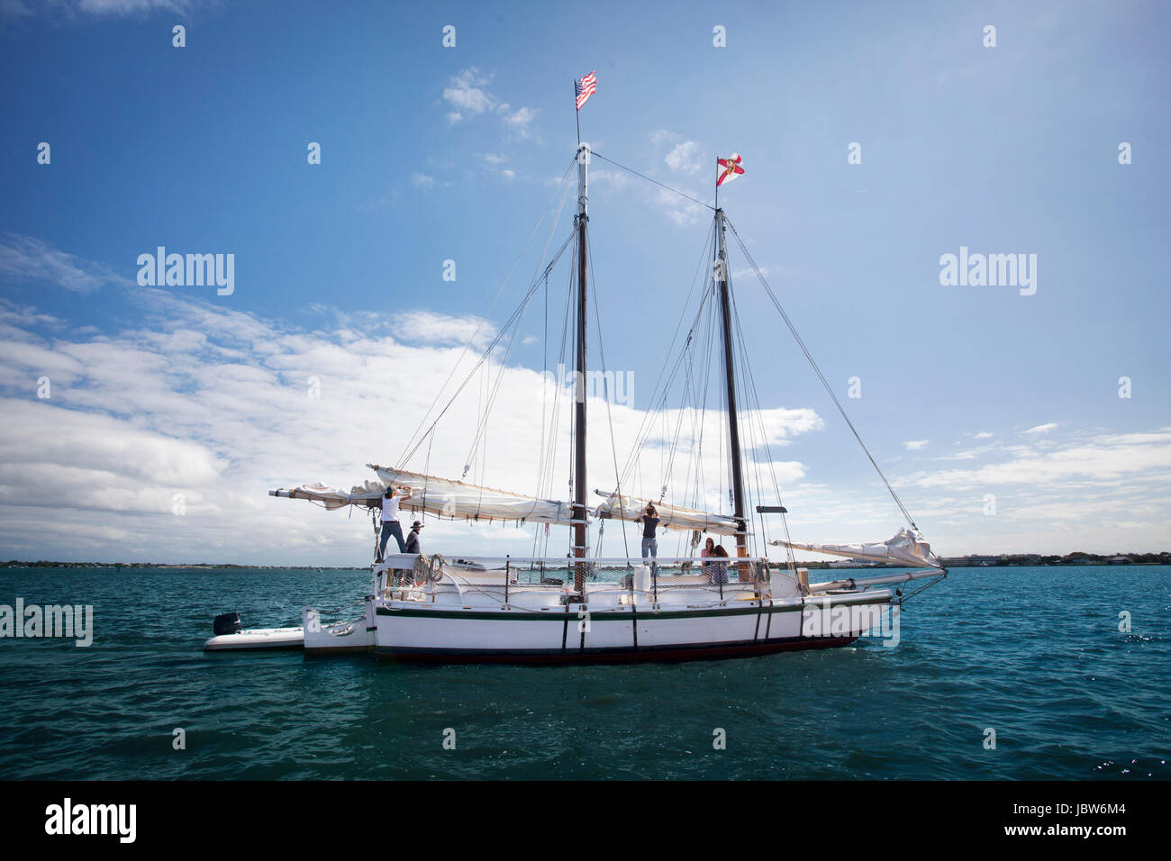 Group of friends on sailing boat on water Stock Photo - Alamy