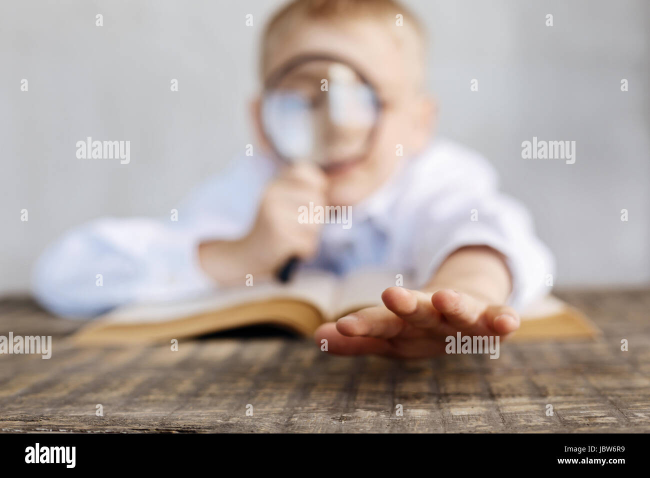 Curious little child exploring new things Stock Photo - Alamy
