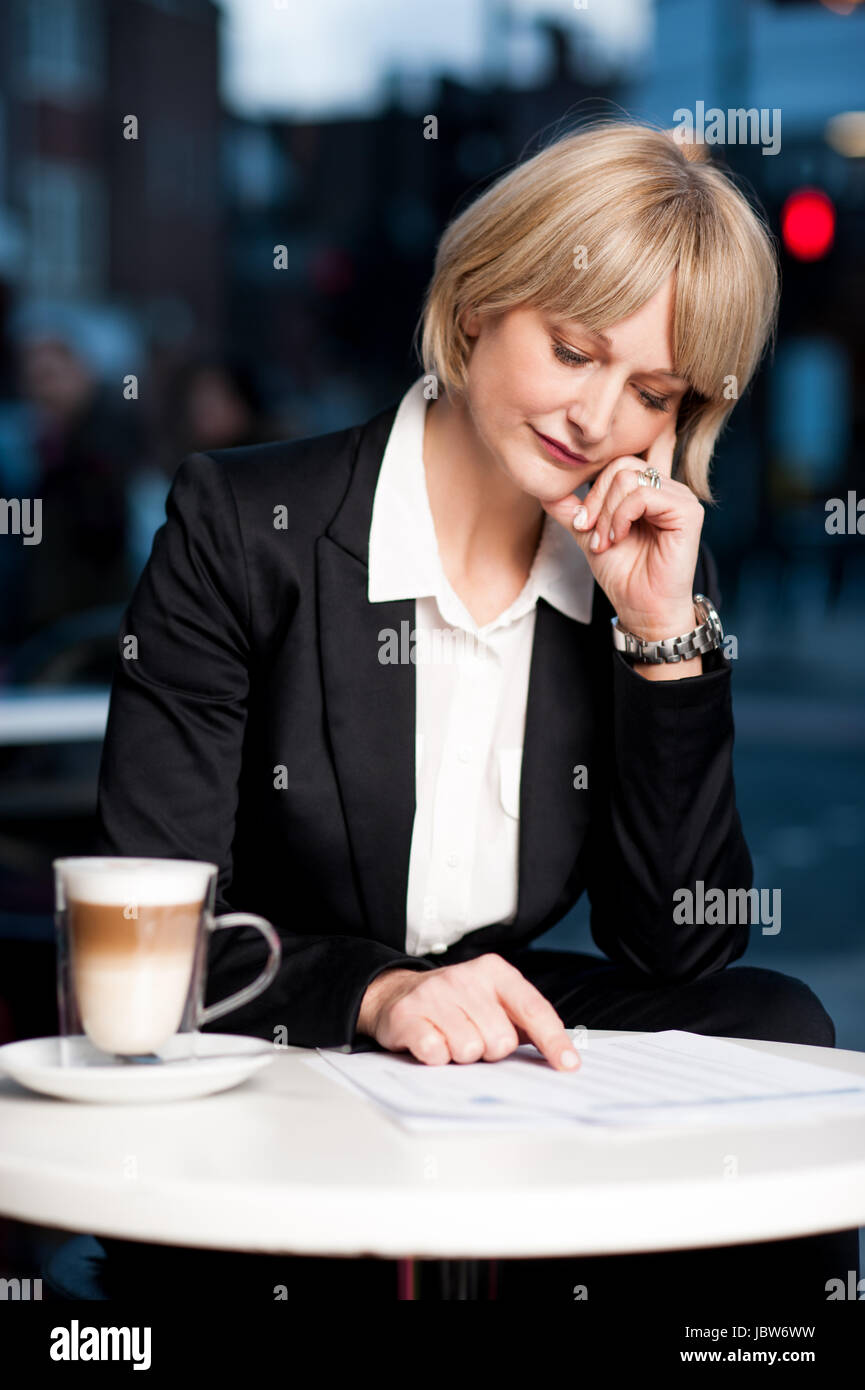 Checking into hotel reports hi-res stock photography and images - Alamy