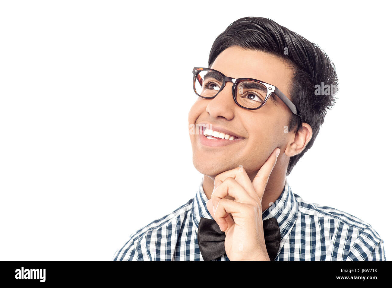 Handsome man looking upwards and thinking, isolated on white Stock ...