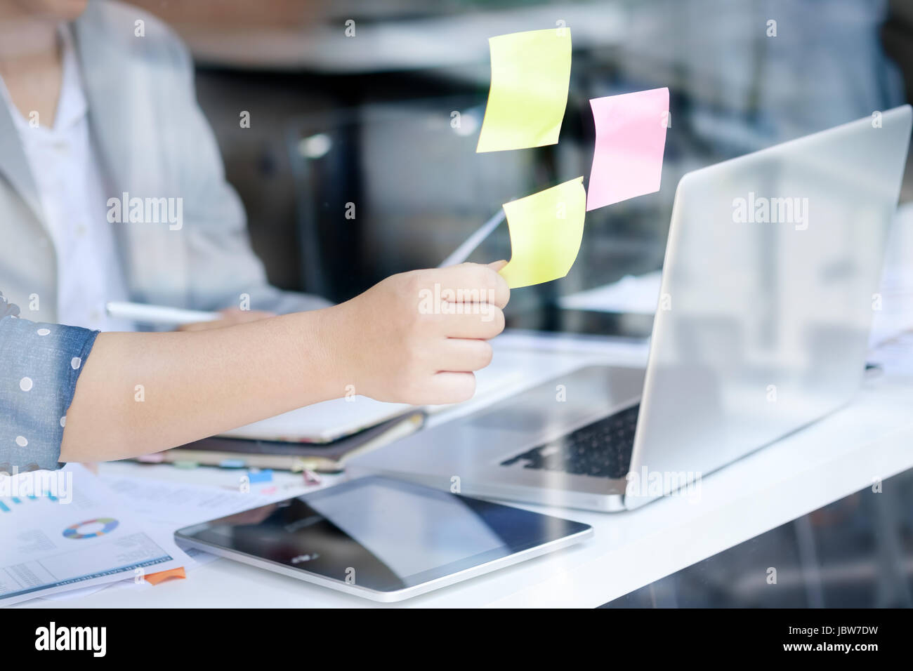 Sticky note paper reminder schedule board. Business people team work ...