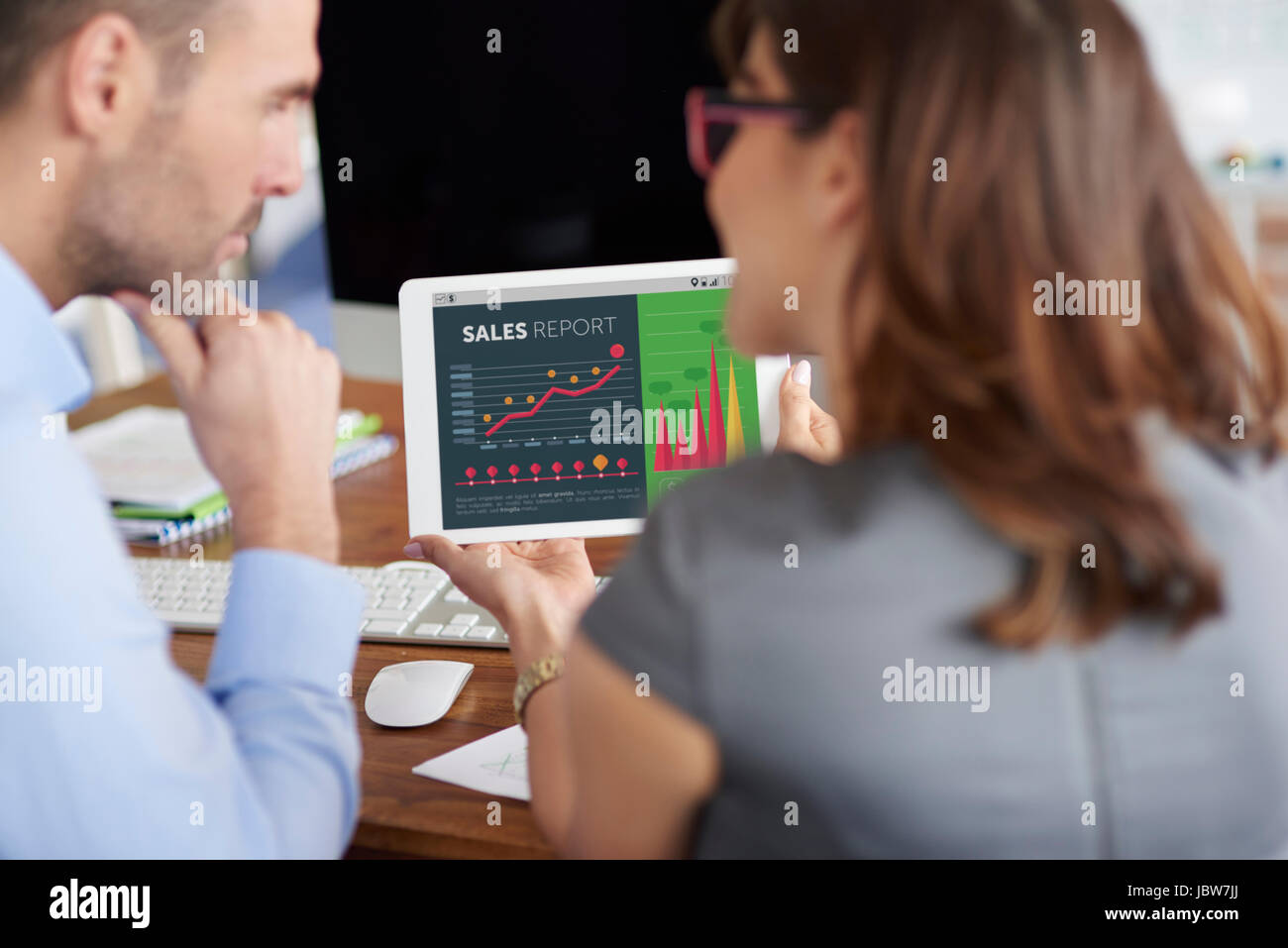 Woman analyzing digital data in hi-res stock photography and images - Alamy