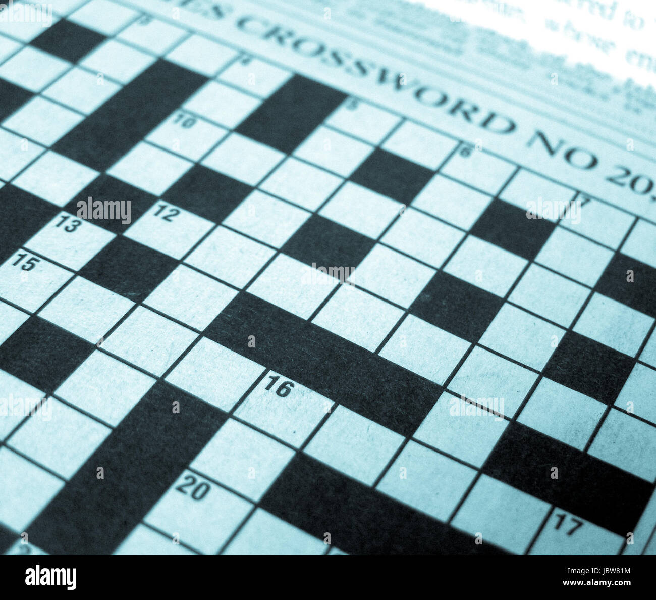 Newspaper crosswords - cool cyanotype Stock Photo - Alamy
