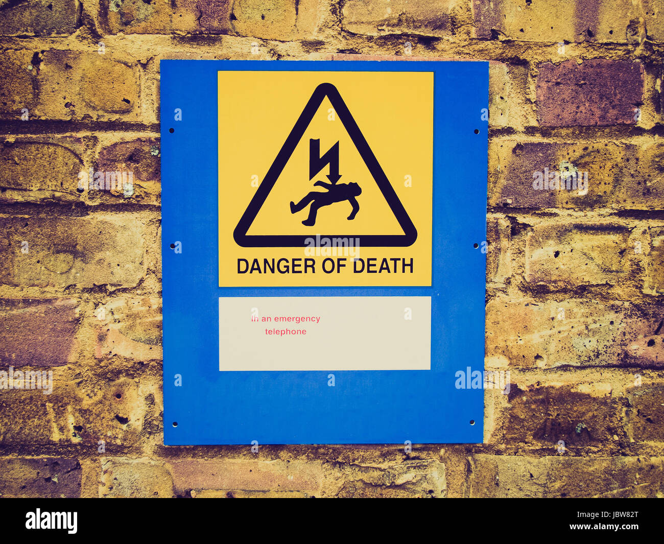 Vintage retro looking A danger of death by electrocution sign Stock ...