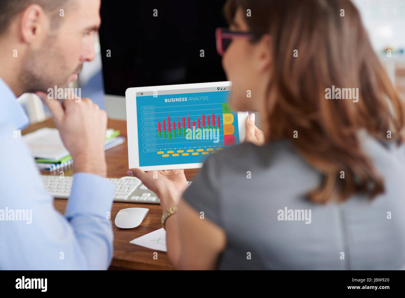 Woman analyzing digital data in hi-res stock photography and images - Alamy