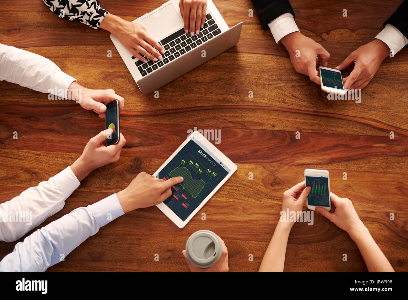 Business people analyzing chart hi-res stock photography and images - Alamy