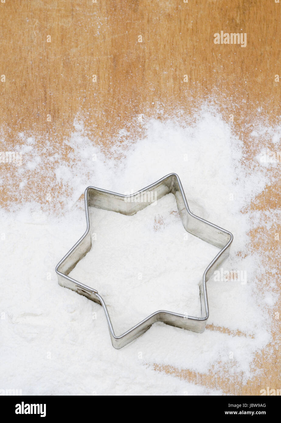 star shaped cookie cutter on flour Stock Photo - Alamy