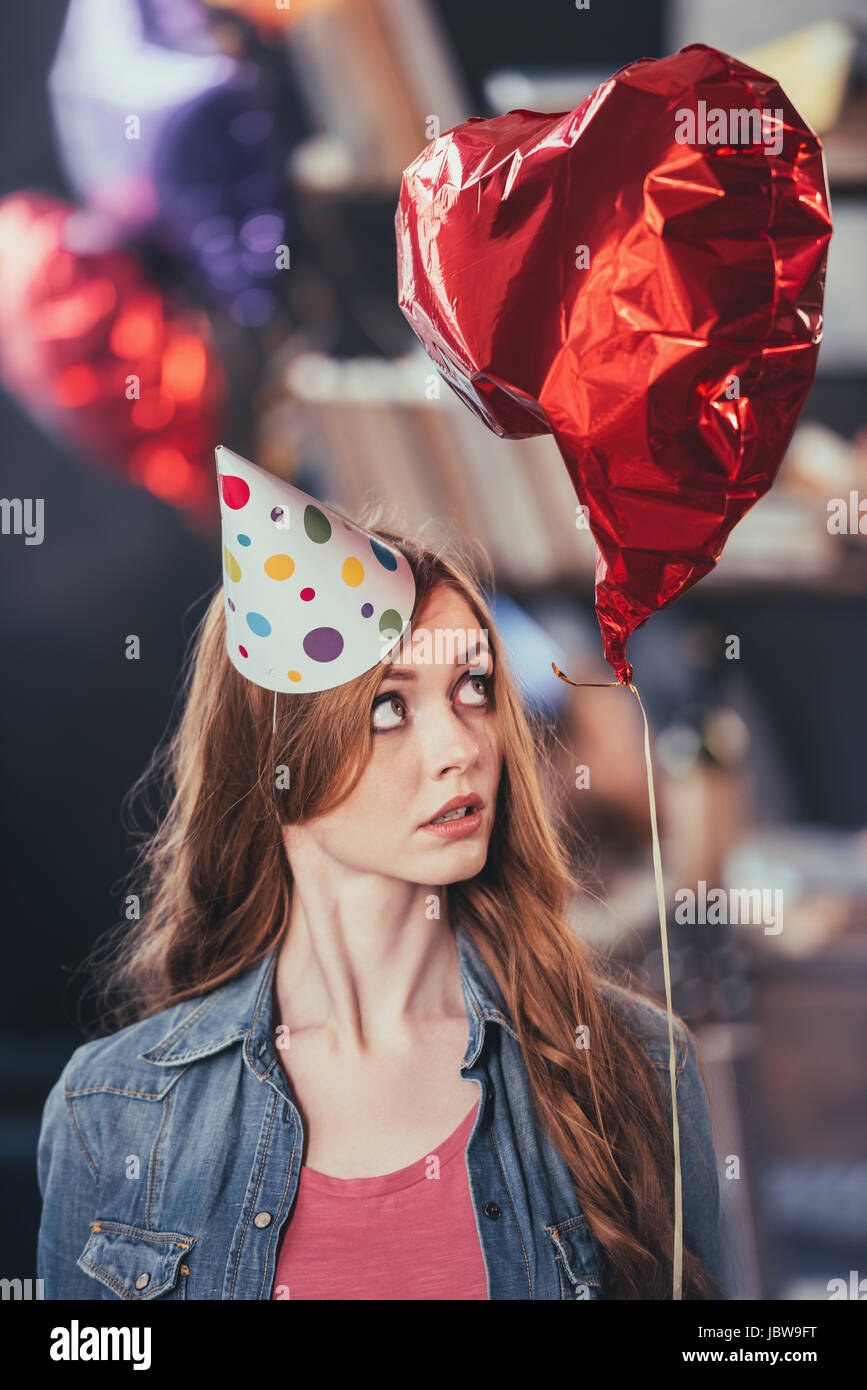 Confused woman at party hi-res stock photography and images - Alamy