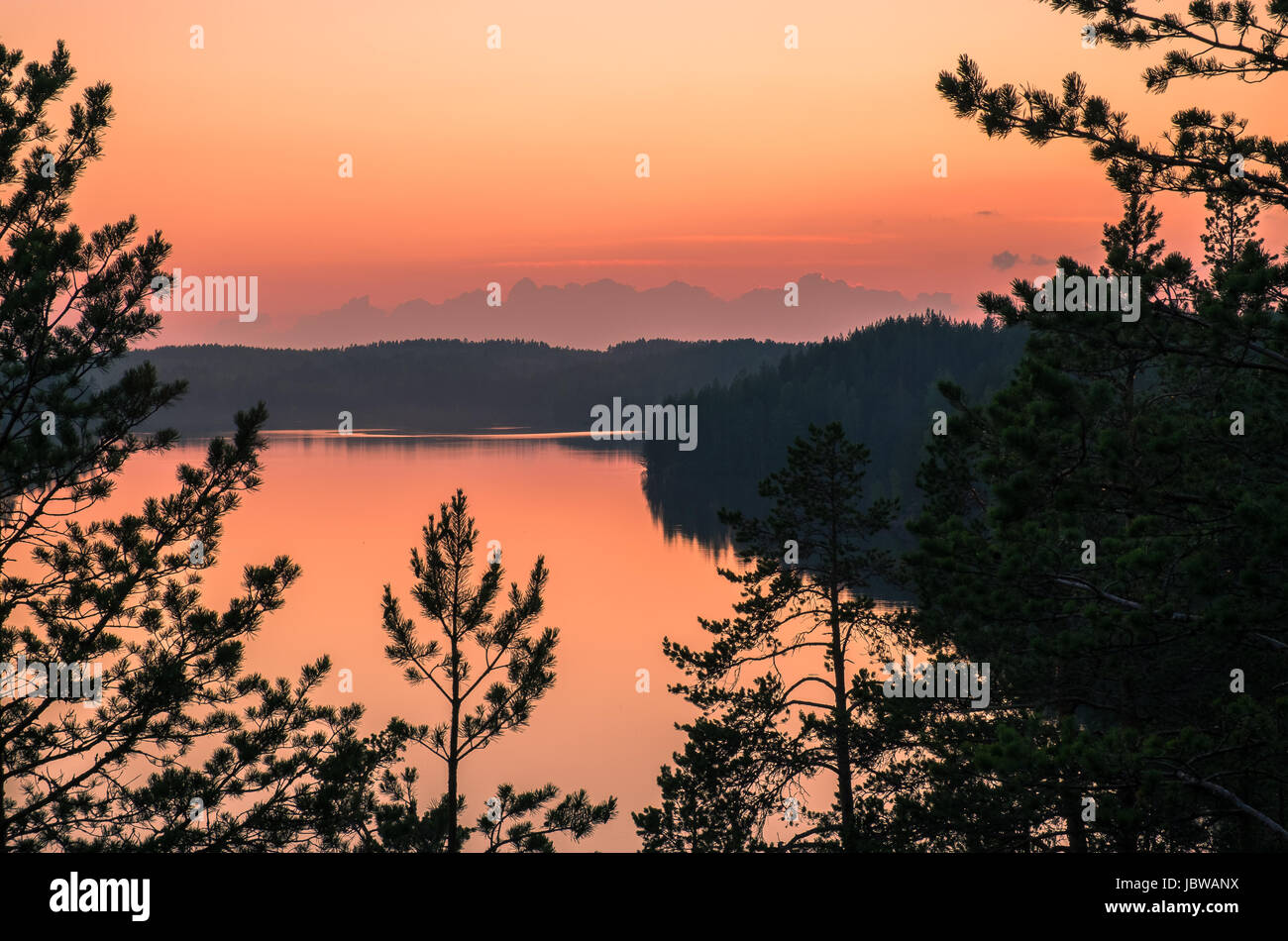 Scenic landscape with sunset and lake at summer night in Finland Stock ...