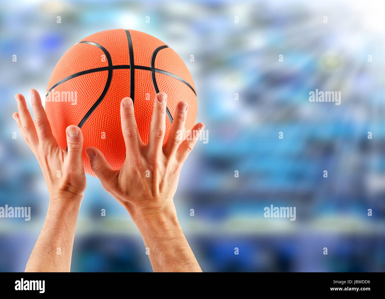 Hands catching basketball hi-res stock photography and images - Alamy