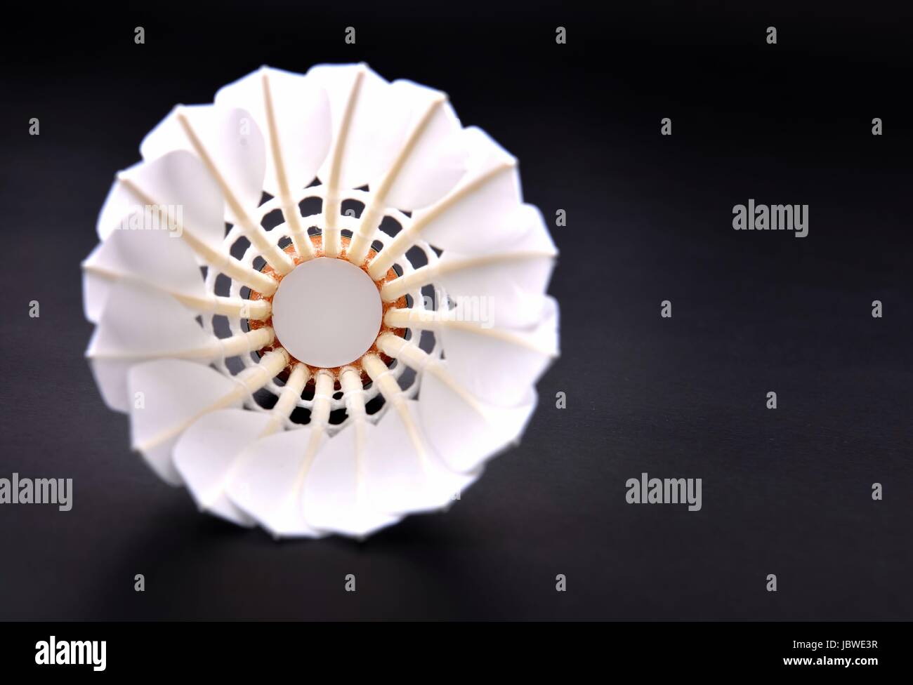 new shuttlecock on dark floor Stock Photo - Alamy