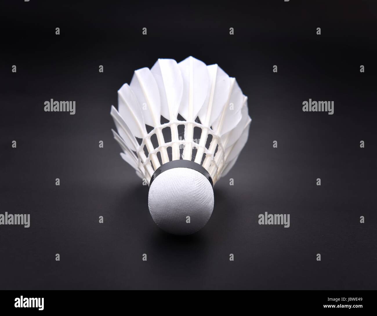 new shuttlecock on dark floor Stock Photo - Alamy