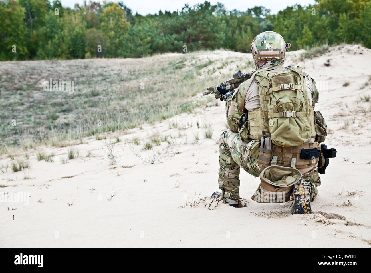 US soldier in the desert during the military operation Stock Photo - Alamy