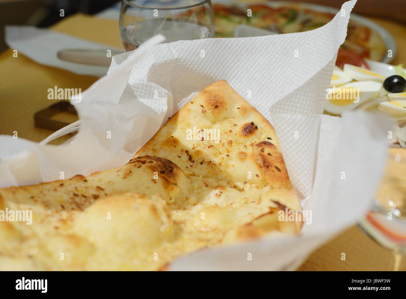 Different food on the table in restaurant Stock Photo - Alamy