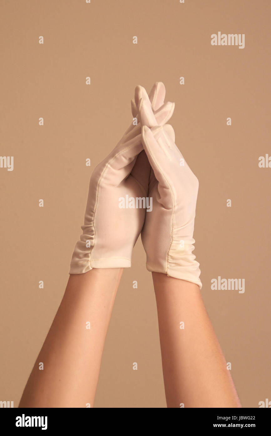 A woman's hands and forearms are shown as she models a vintage pair of ...