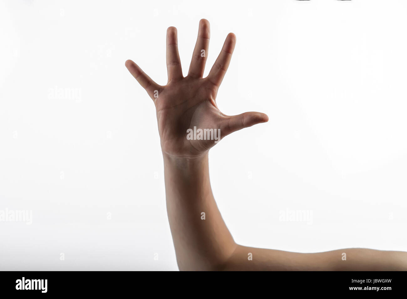 Young hands makes a gesture: sign of 5 fingers Stock Photo - Alamy