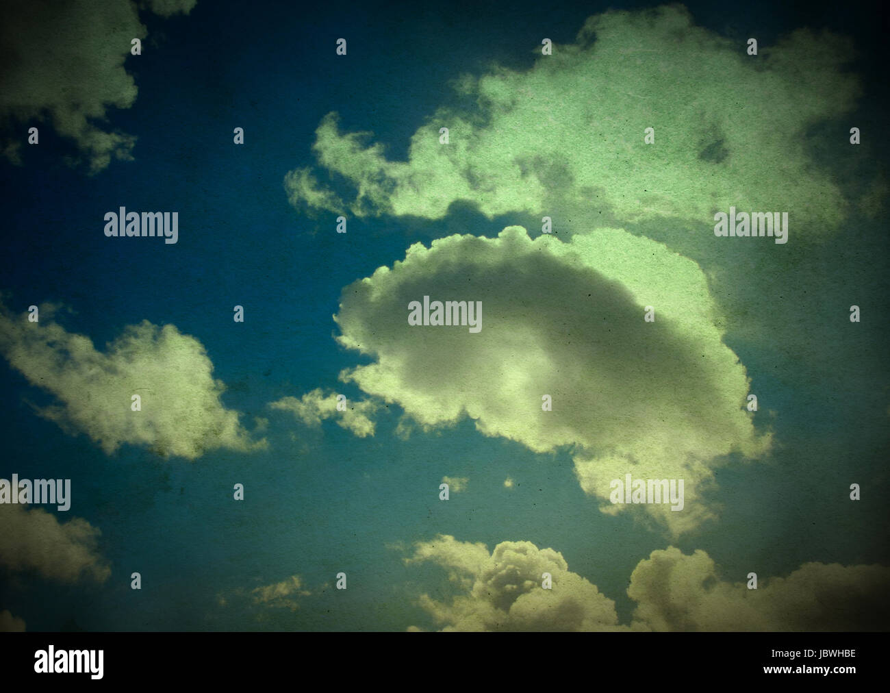 Retro grunge clouds background with dust specks Stock Photo - Alamy