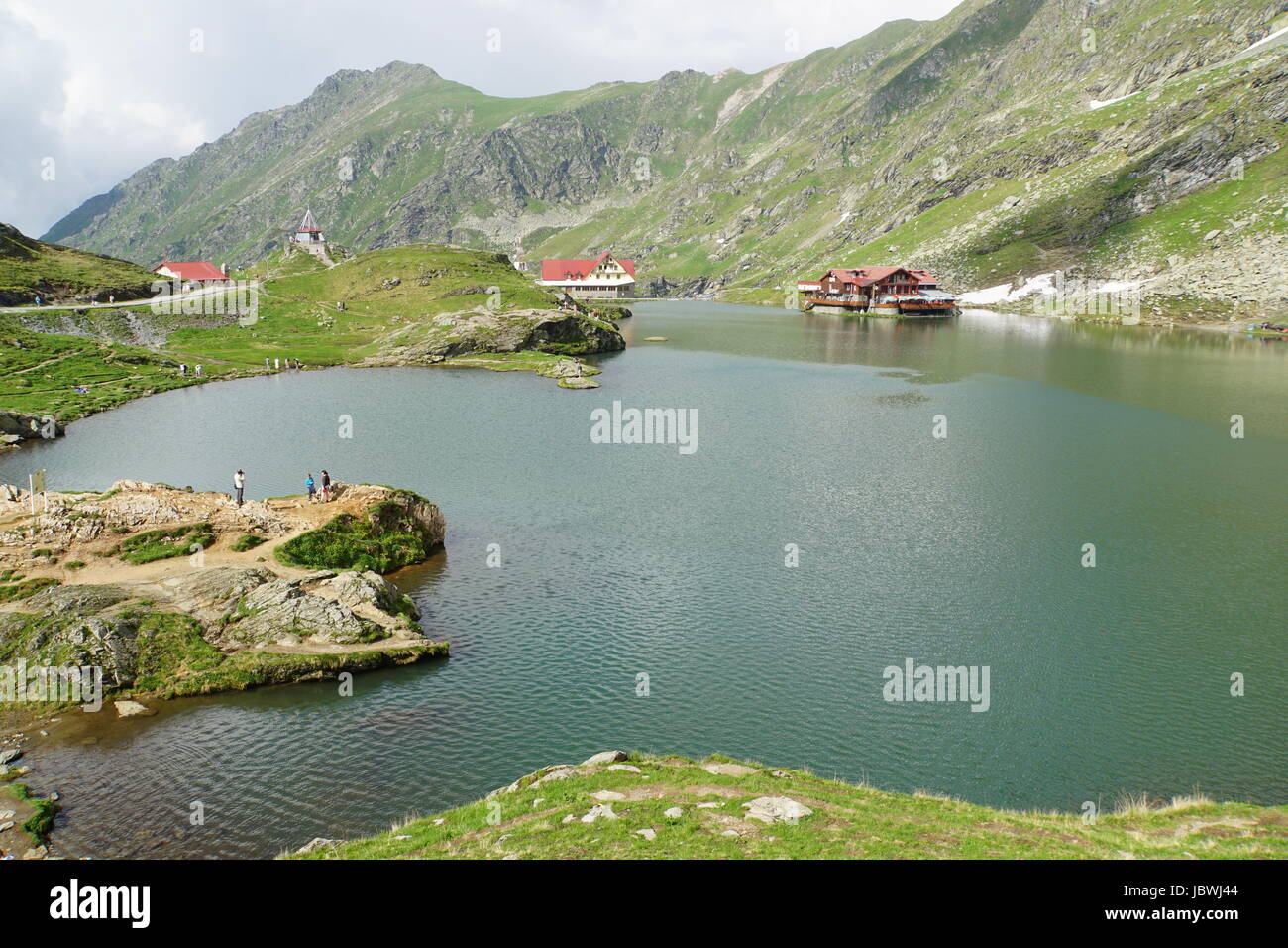 Balea Lac Chalet over Balea glacier Lake next to Transfagarasan Road in ...
