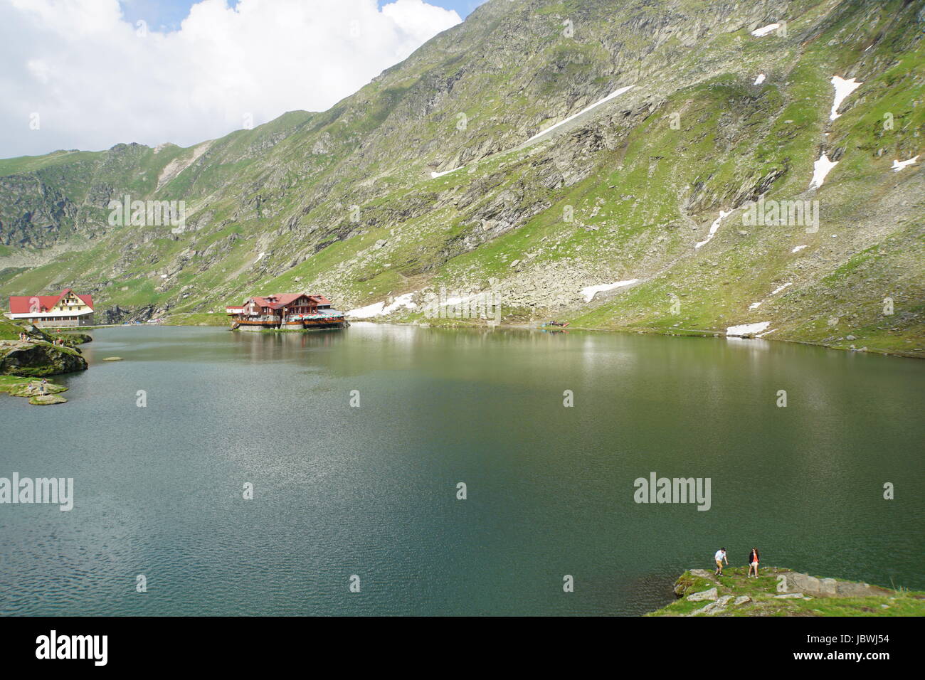 Balea Lac Chalet over Balea glacier Lake next to Transfagarasan Road in ...